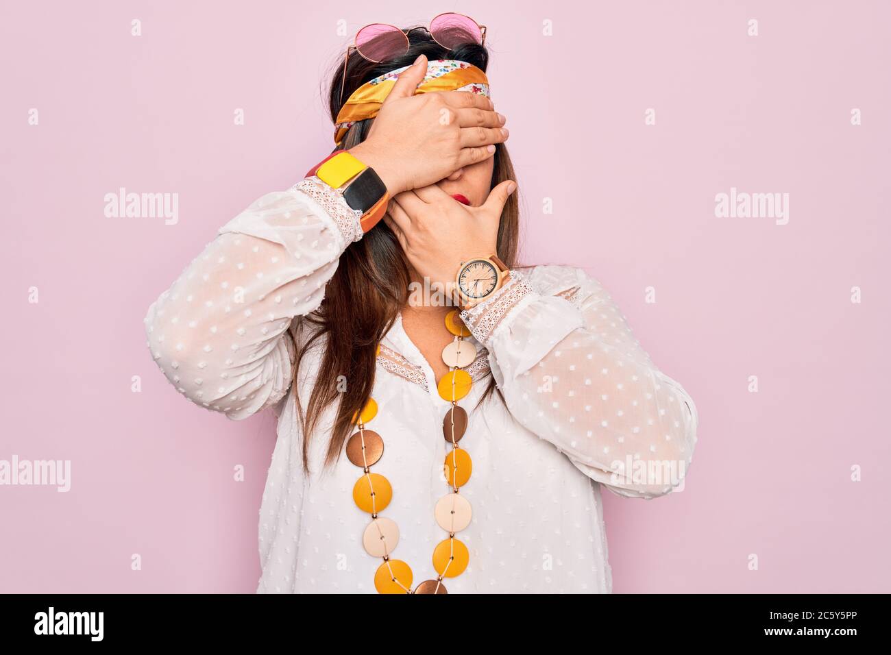 Young hispanic hippie woman wearing fashion boho style and sunglasses ...