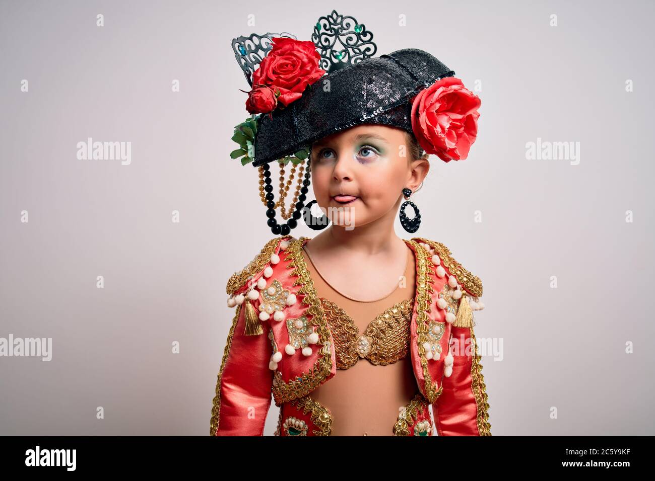 Young little caucasian kid girl wearing bullfighter traditional folkore ...