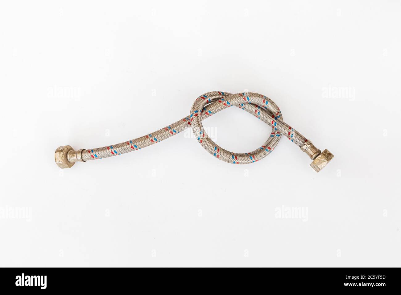 Reinforced hose isolated on white background top Stock Photo - Alamy