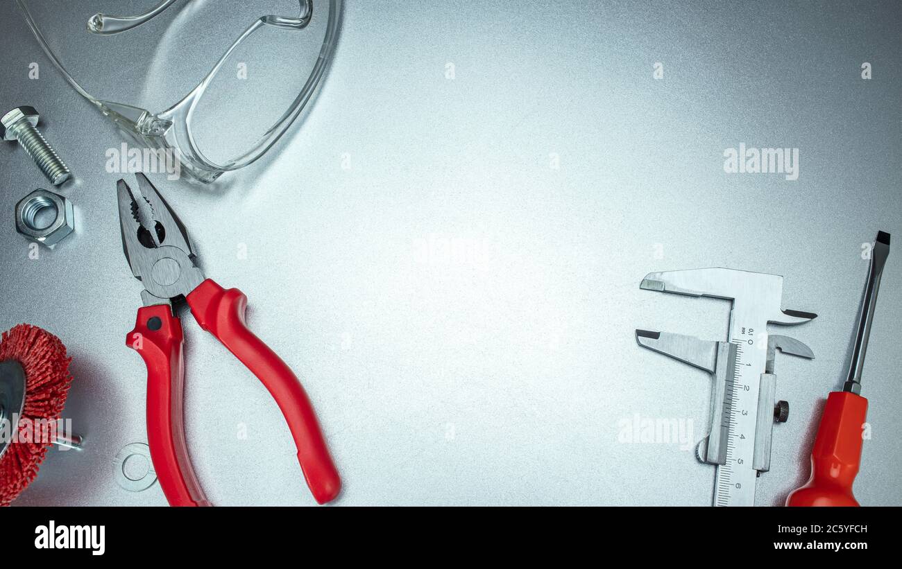 different kinds of hand tools and accessories for work or DIY on shiny ...