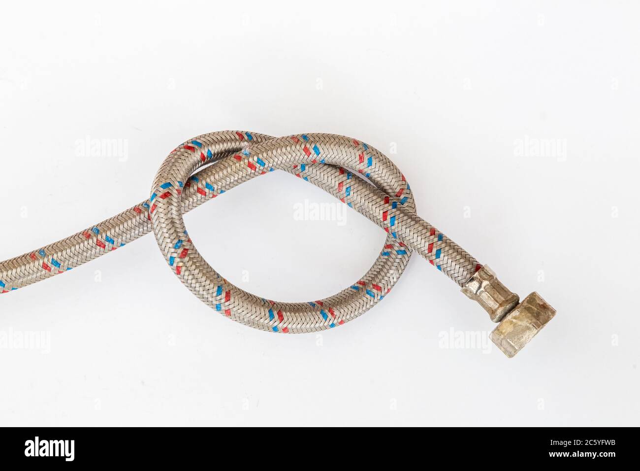 Reinforced hose isolated on white background top Stock Photo - Alamy