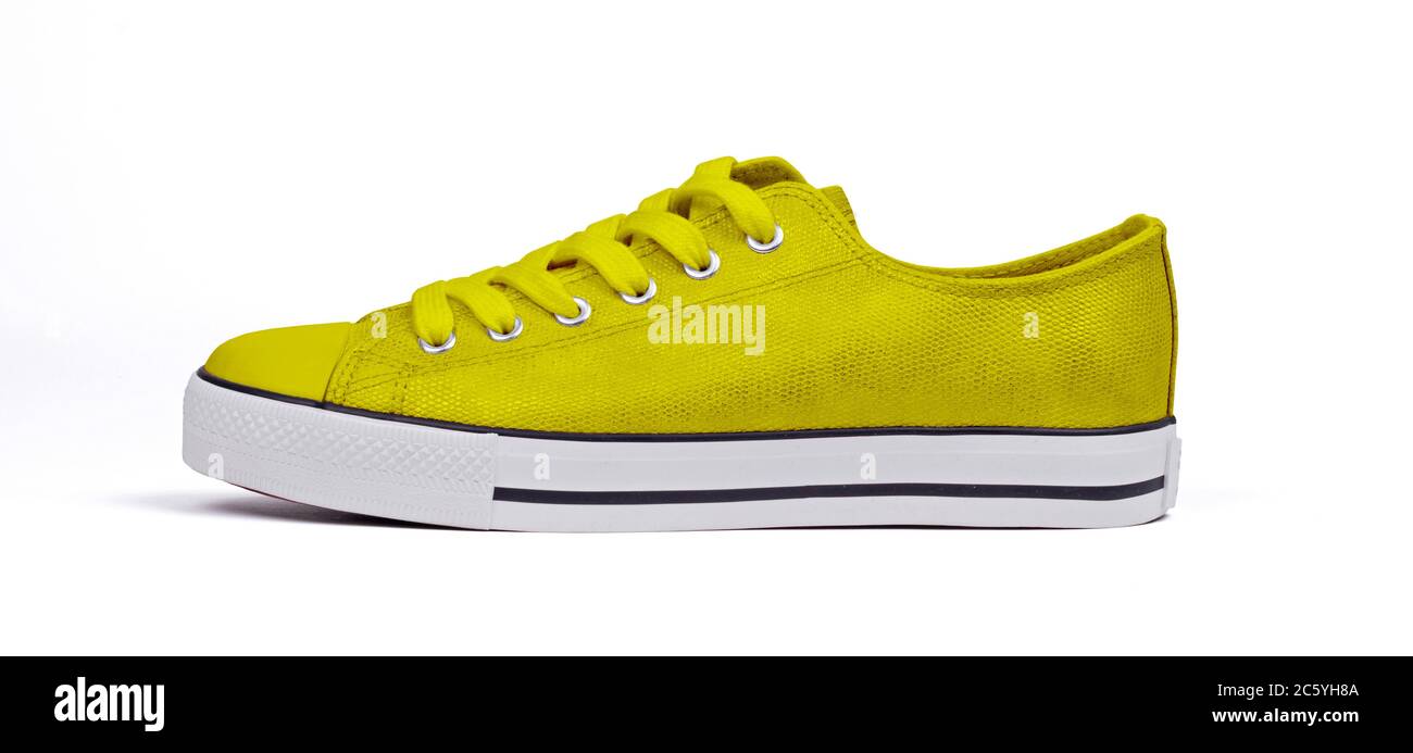 Single shoe isolated on white background - Yellow Stock Photo - Alamy