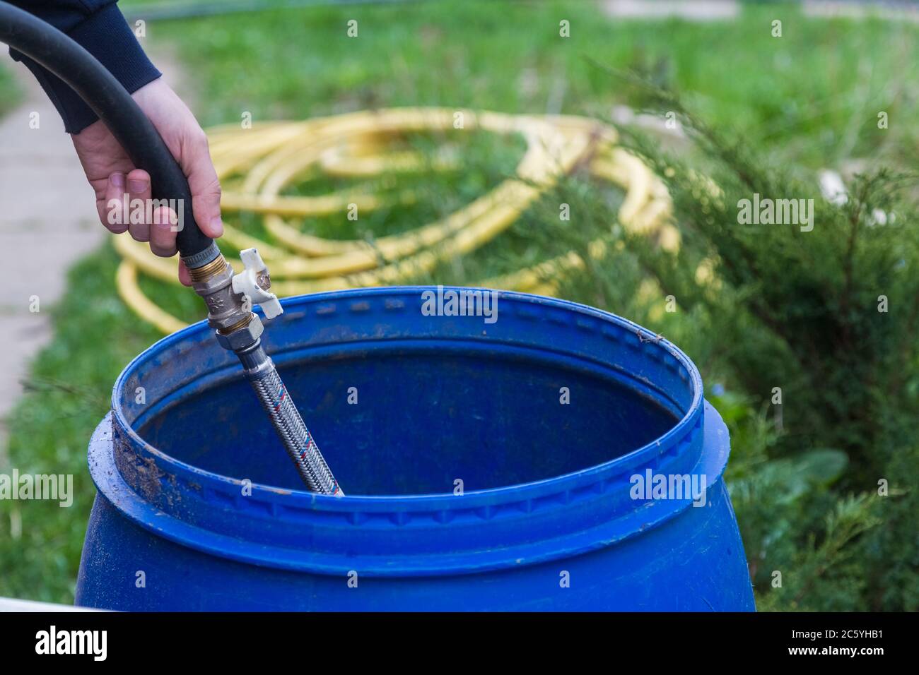 Plastic barrels vertical hi-res stock photography and images - Alamy