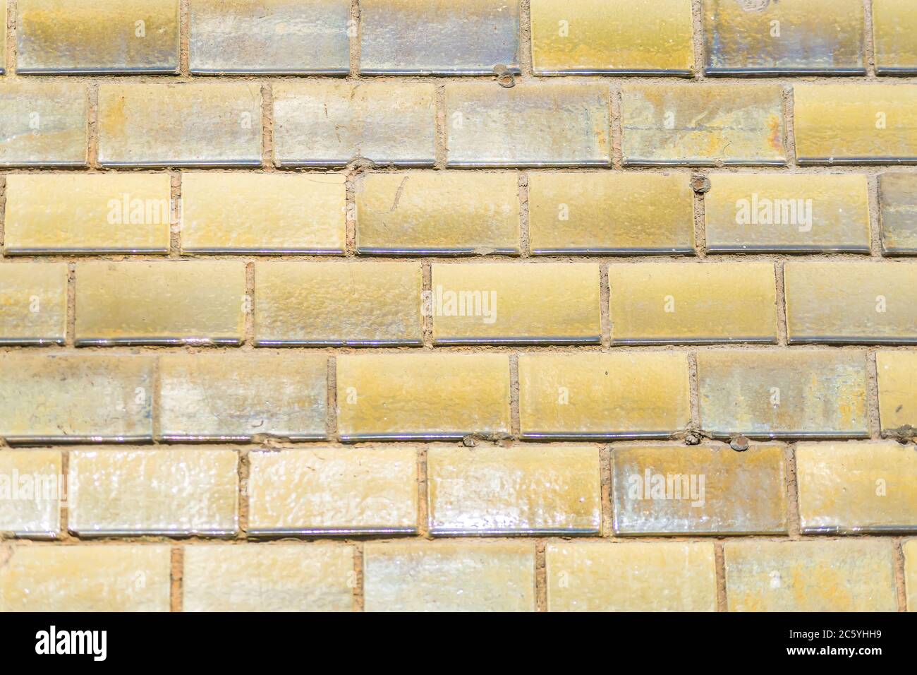 golden brick wall background texture Stock Photo - Alamy