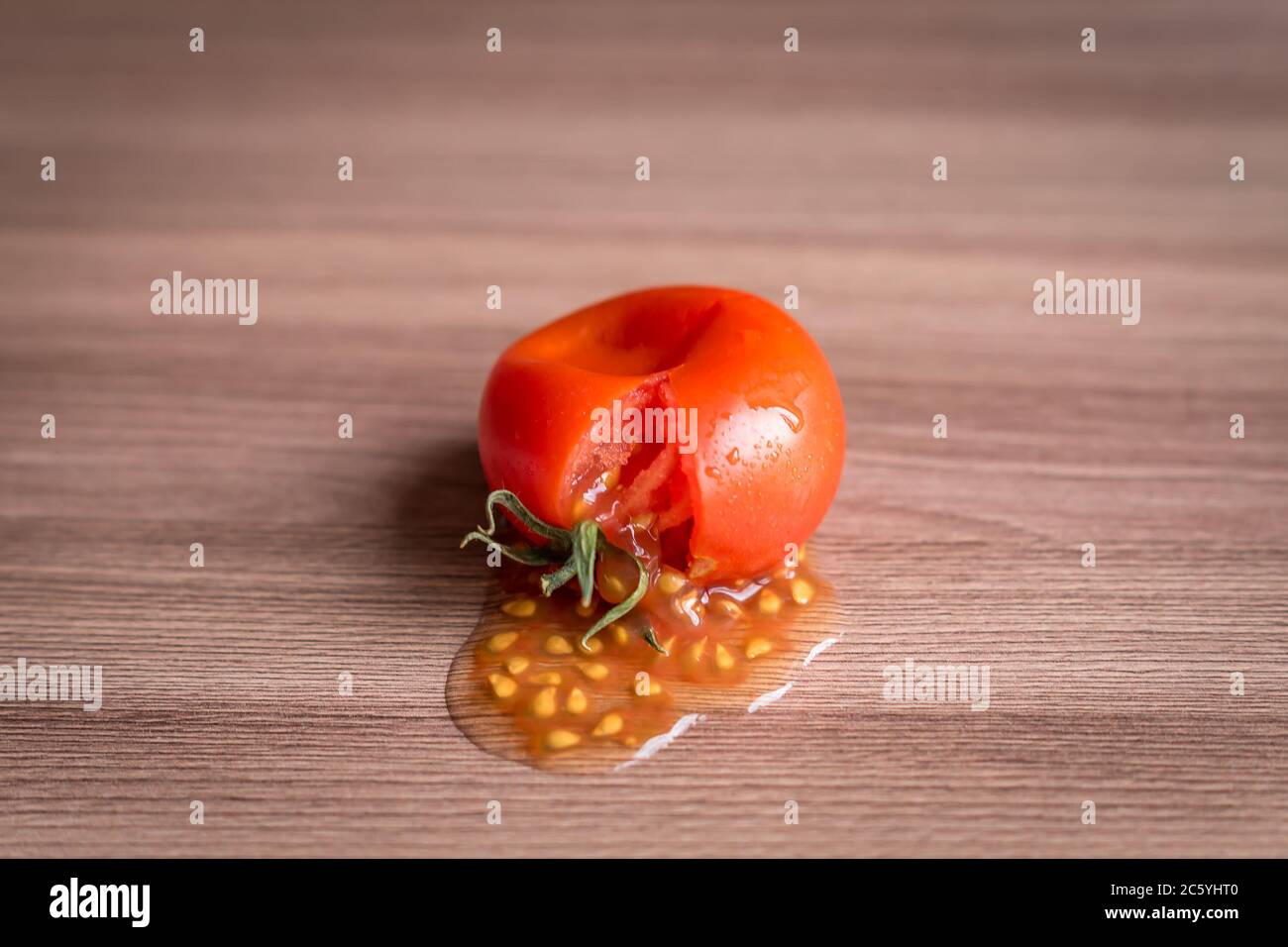 Squished tomato hi-res stock photography and images - Alamy