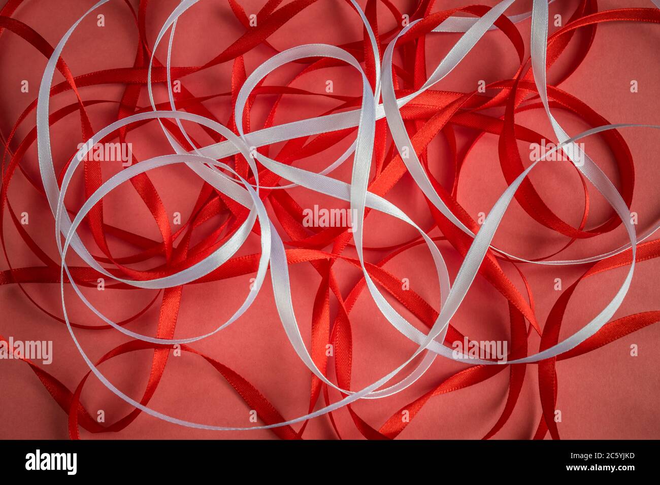 red and white ribbons for background Stock Photo - Alamy