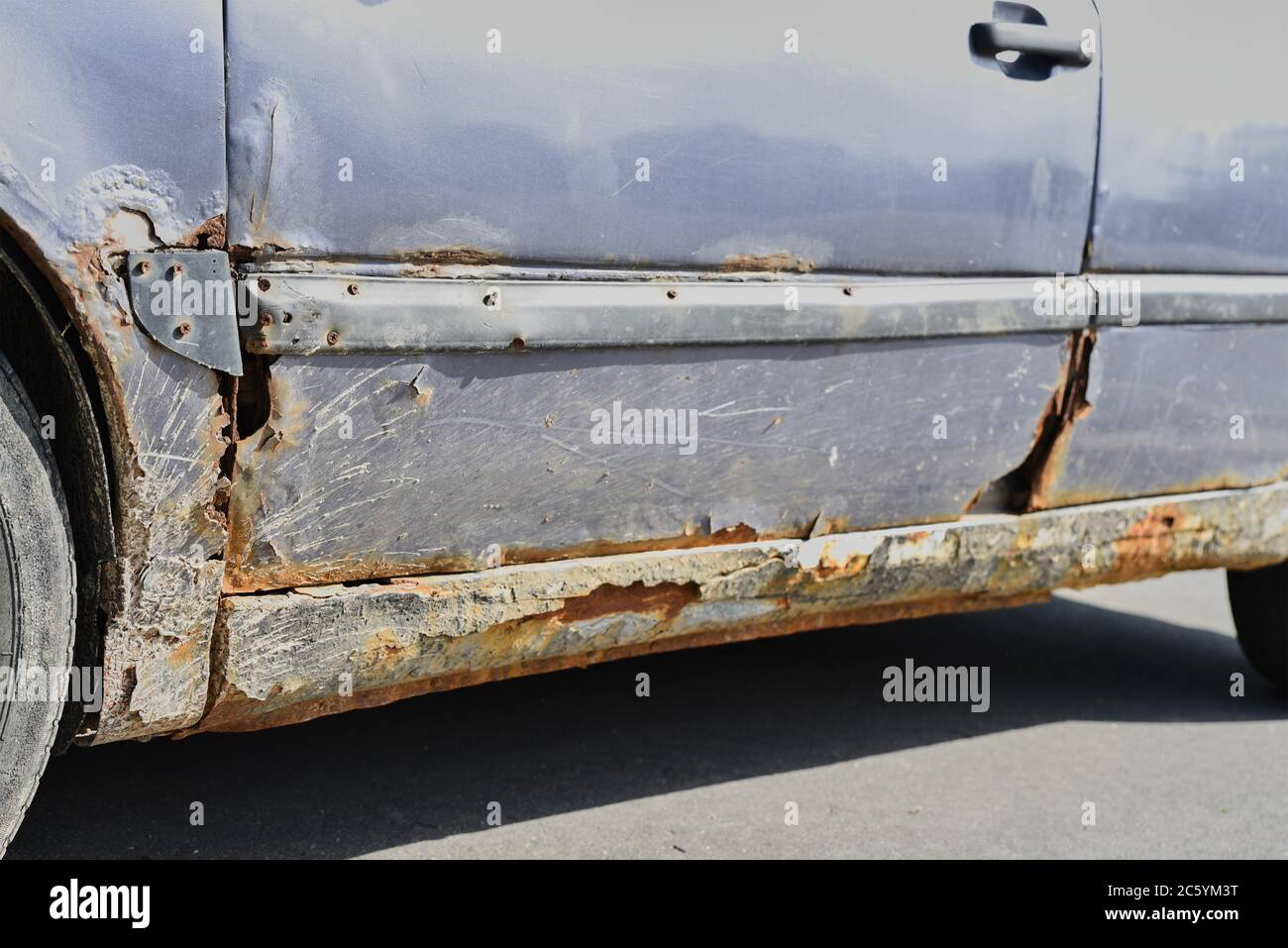 Rusty old car damaged by corrosion. Influence of salt and reagents in winter on car Stock Photo ...
