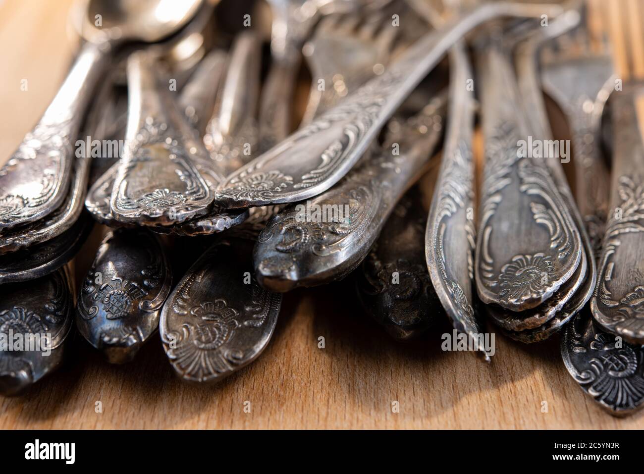 Tarnished spoons hi-res stock photography and images - Alamy