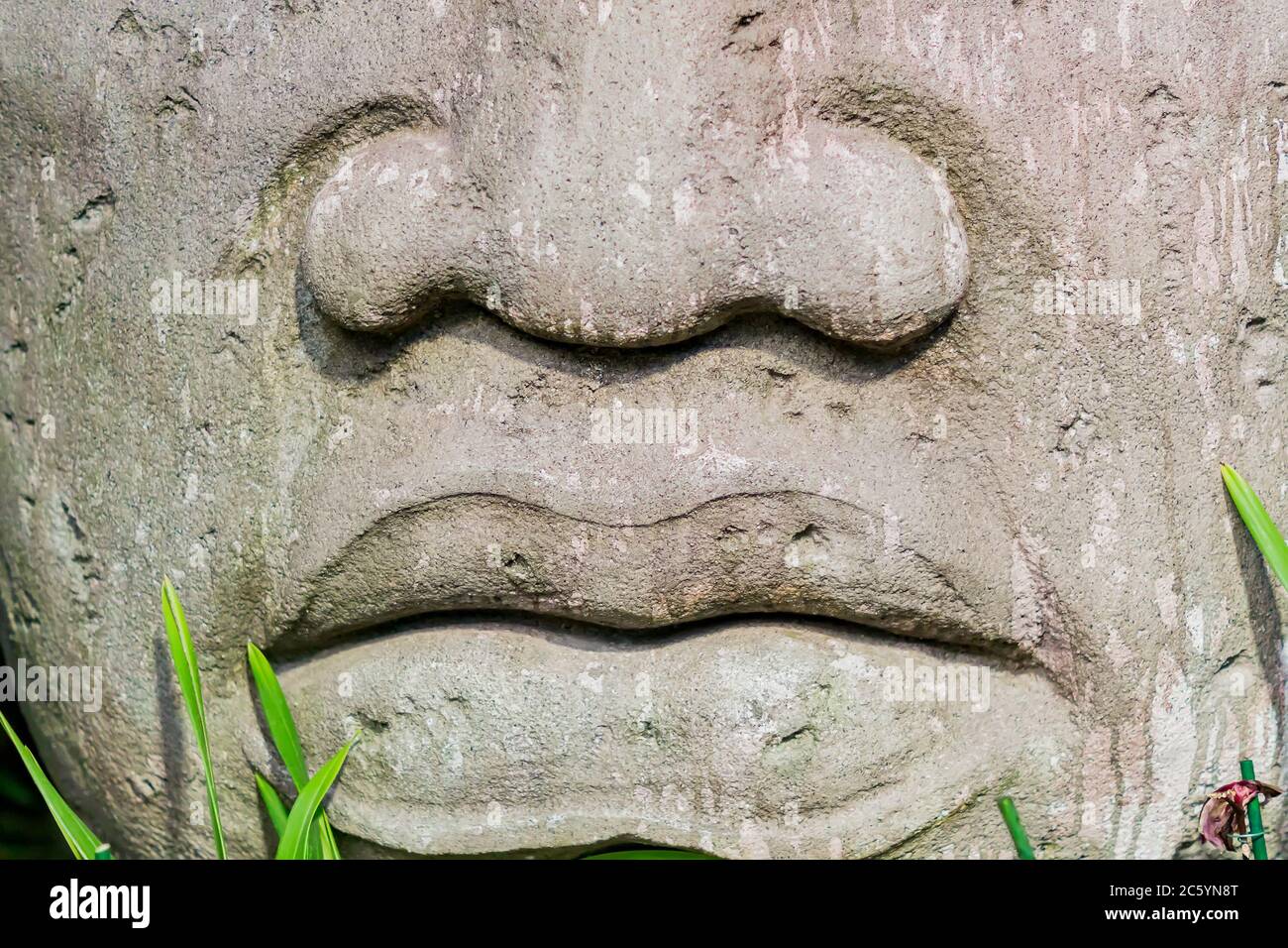 Carved stone idol head statue hi-res stock photography and images - Alamy