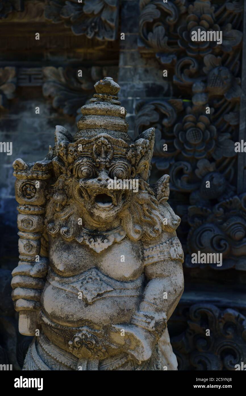 Ancient Balinese statue at the temple in Bali Indonesia Stock Photo - Alamy