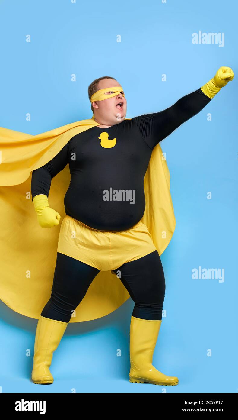 let's save the planet from dirt portrait of cleaning fat man in yellow ...