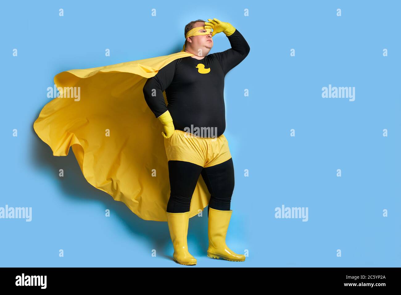 fat superhero caucasian man is able to save the world, he is wearing ...