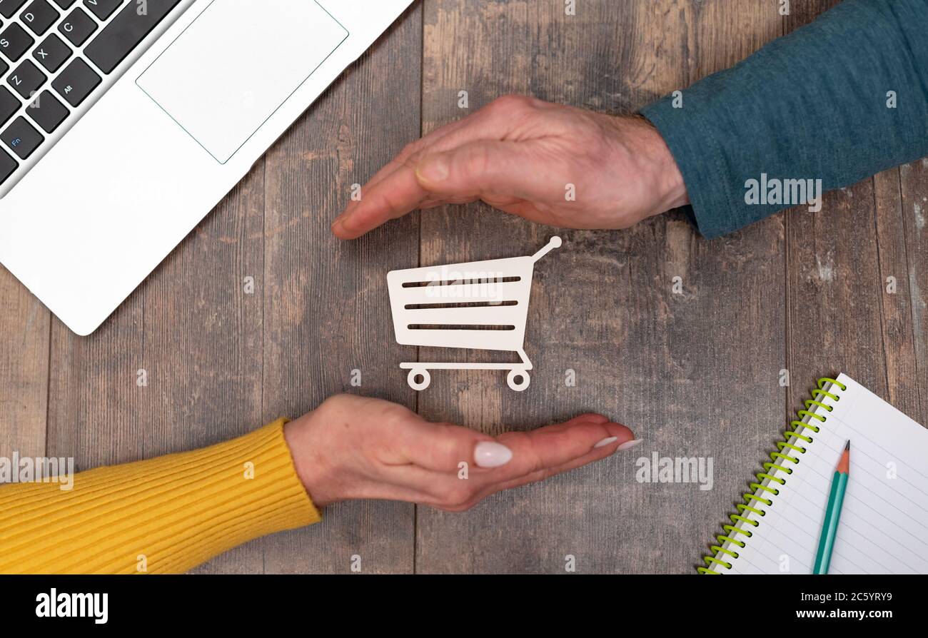 Hands protect shopping cart hi-res stock photography and images - Alamy