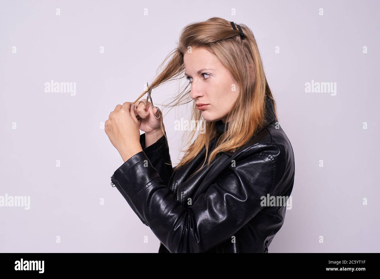 Cutting hair scissors unhappy hi-res stock photography and images - Alamy