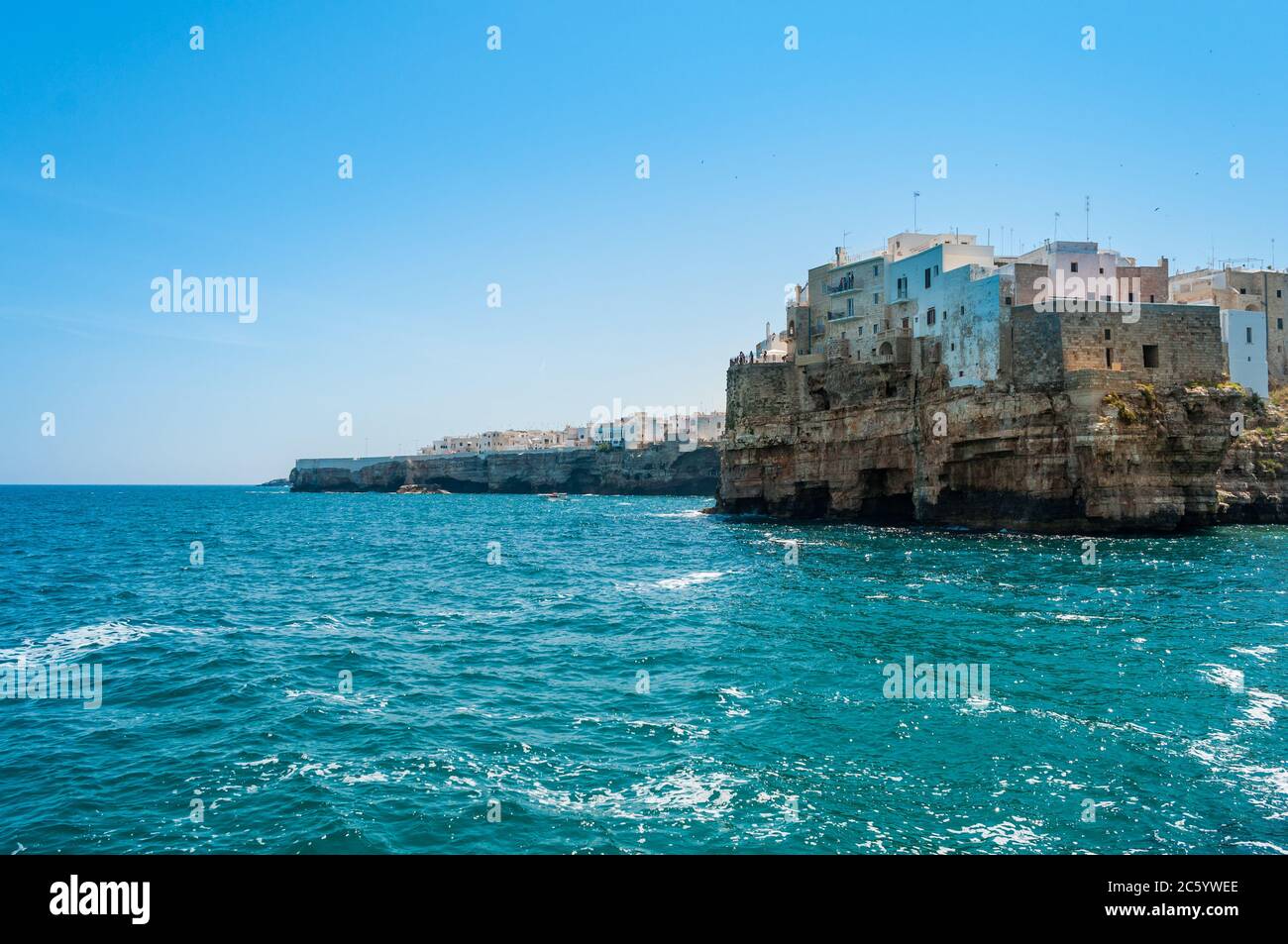 Ancient buildings on the rocks surrounded by sea water Stock Photo - Alamy