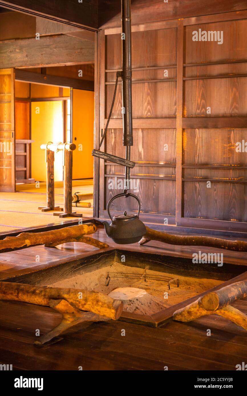 A brazier in Kitchen, a traditional Japanese farmhouse in the precinct ...