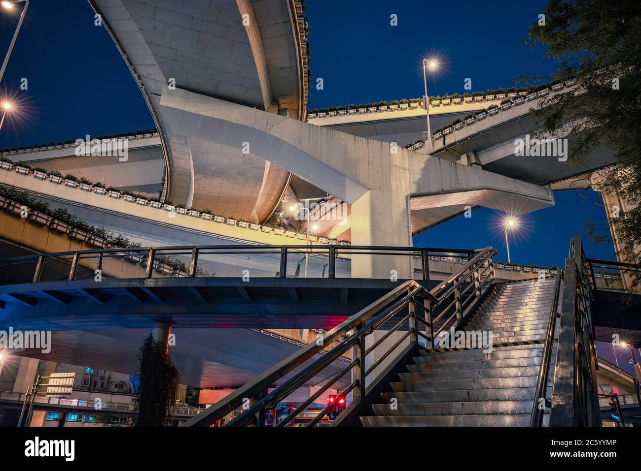 Night view of a pedestrian bridge in Shanghai, China Stock Photo - Alamy