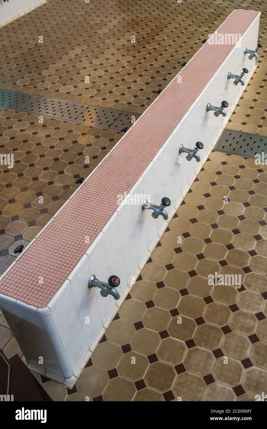 An old-fashioned tap inside Public Bathroom Stock Photo - Alamy