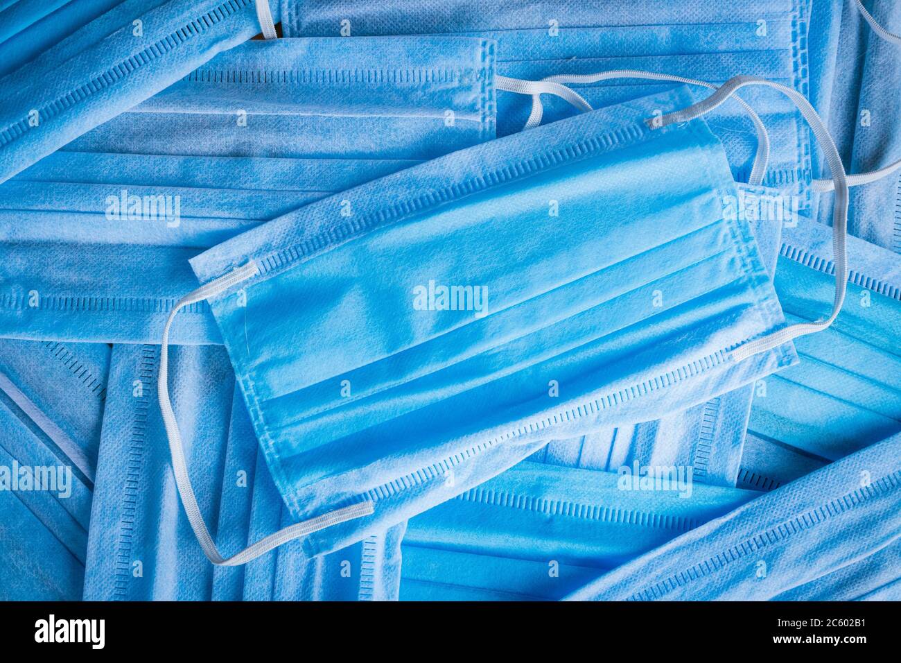 Blue medical masks hi-res stock photography and images - Alamy