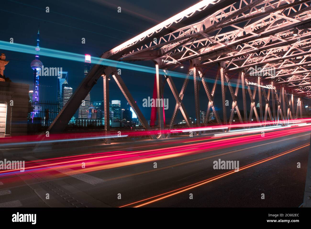 Night view of Waibaidu Bridge, a landmark steel bridge in Shanghai ...