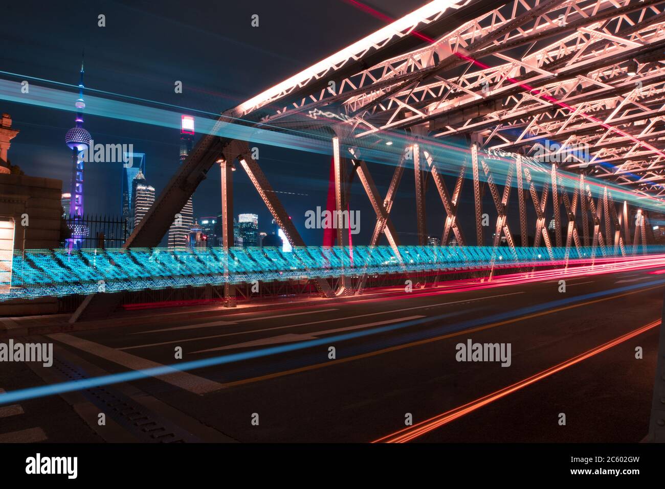 Night view of Waibaidu Bridge, a landmark steel bridge in Shanghai ...