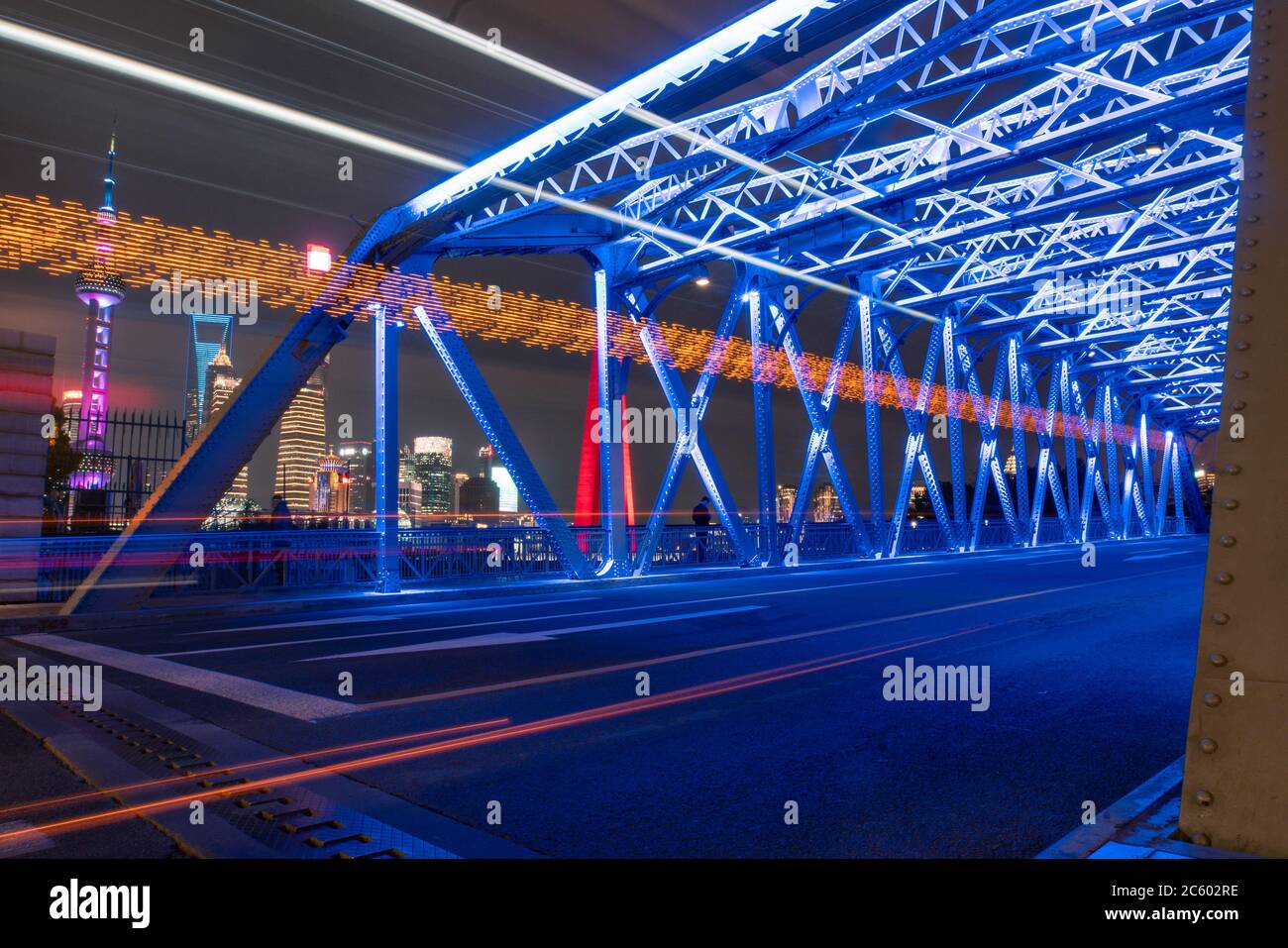 Night view of Waibaidu Bridge, a landmark steel bridge in Shanghai ...