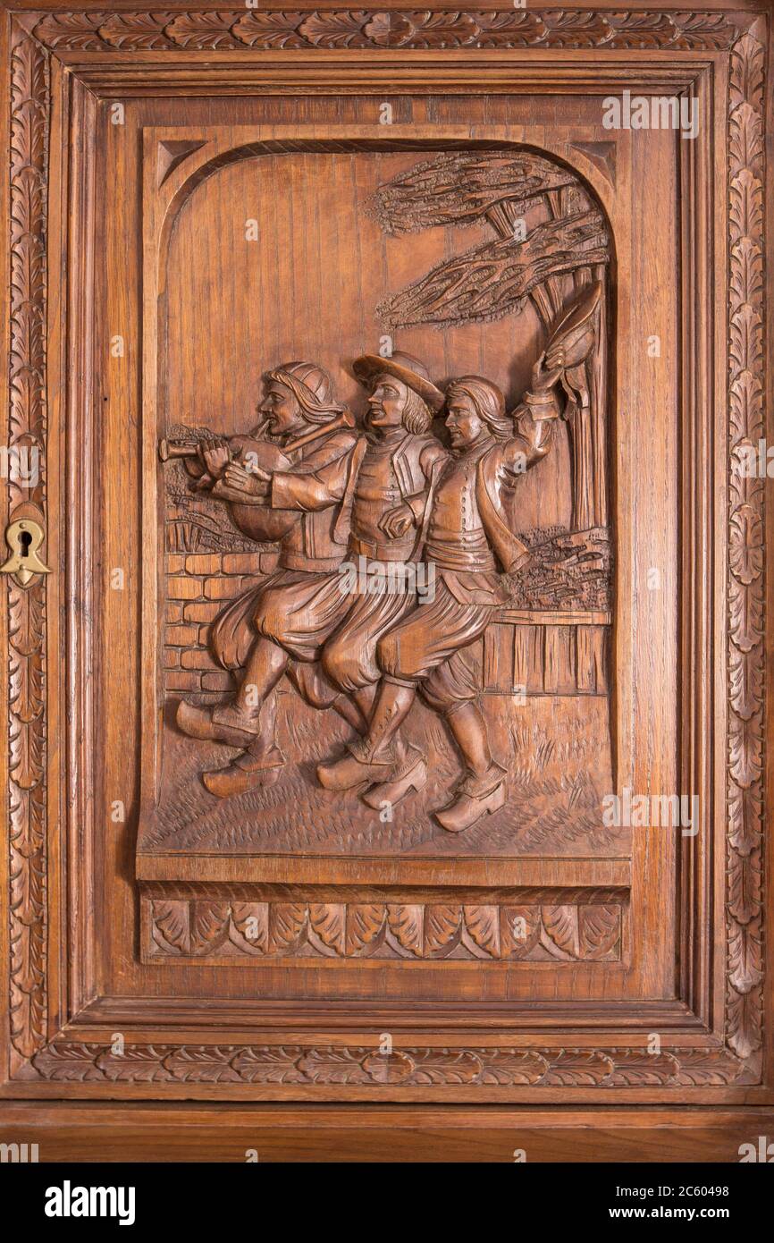 Part of old sideboard as example of beautiful wooden carving background ...