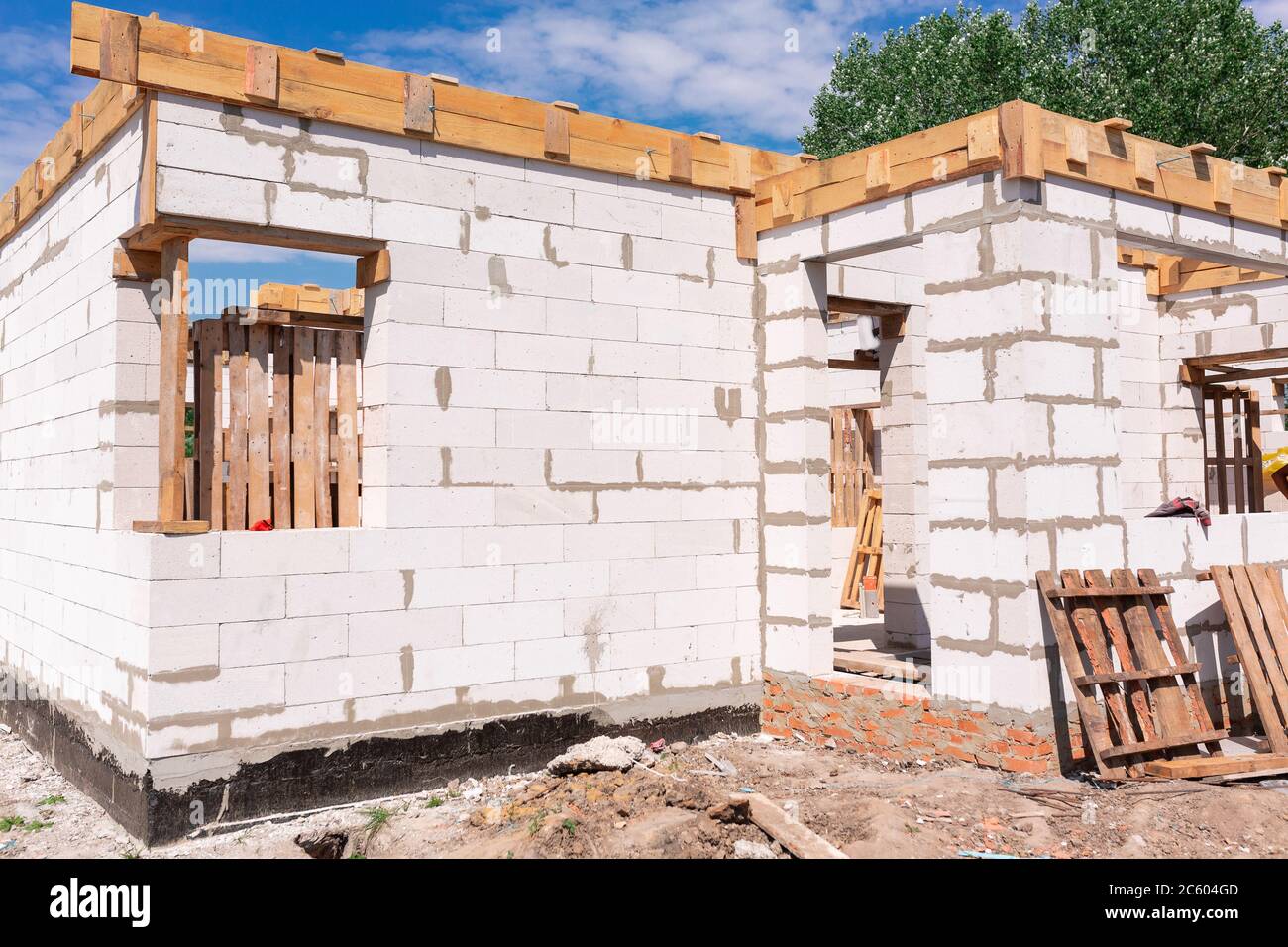 Building site of a house under construction: walls of gas concrete ...
