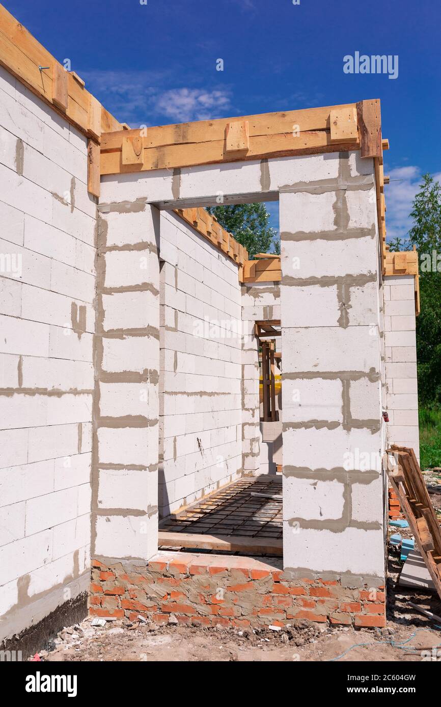 Building site of a house under construction: walls of gas concrete ...