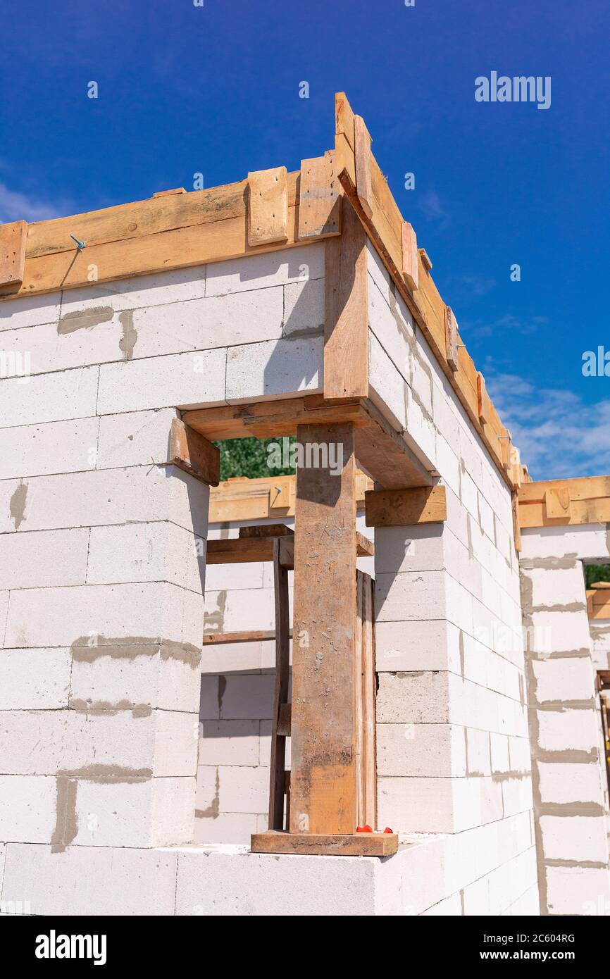 Building site of a house under construction: walls of gas concrete ...