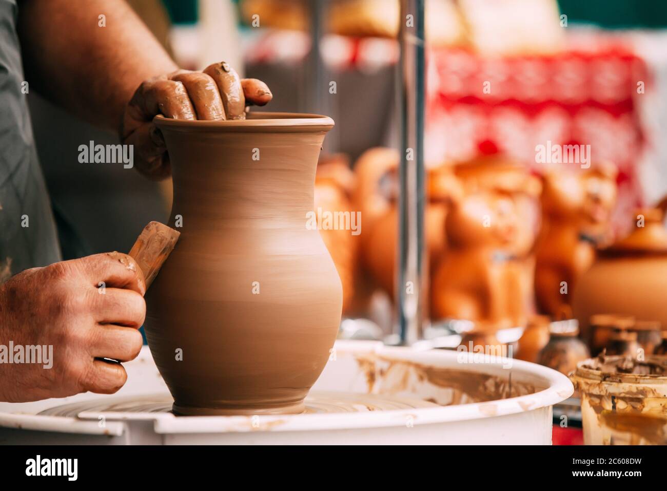 Process Of Creating A Clay Pot. Using Hands. Pottery Craft Wheel And ...