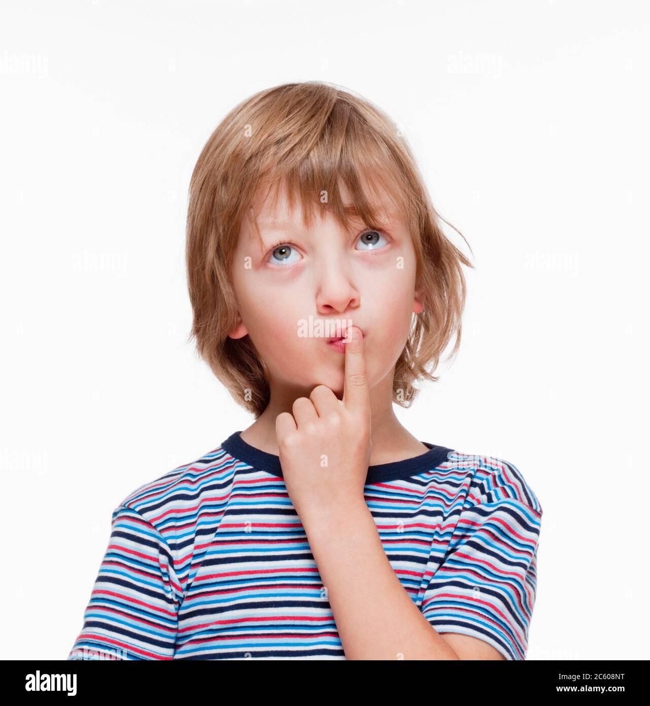 Child with finger on lips hi-res stock photography and images - Alamy