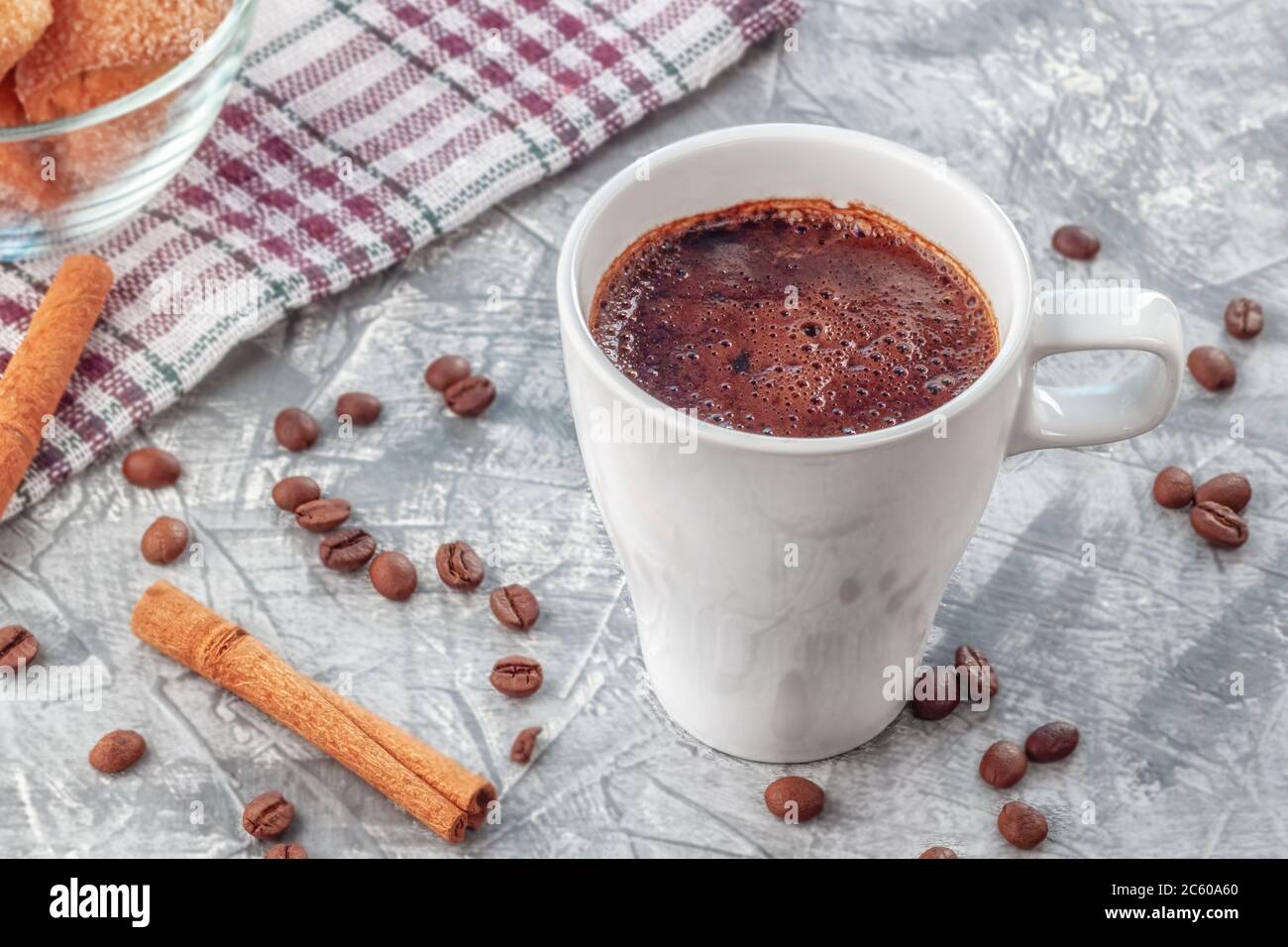 Coffee with cream and freshly baked puffs on a gray background Stock ...