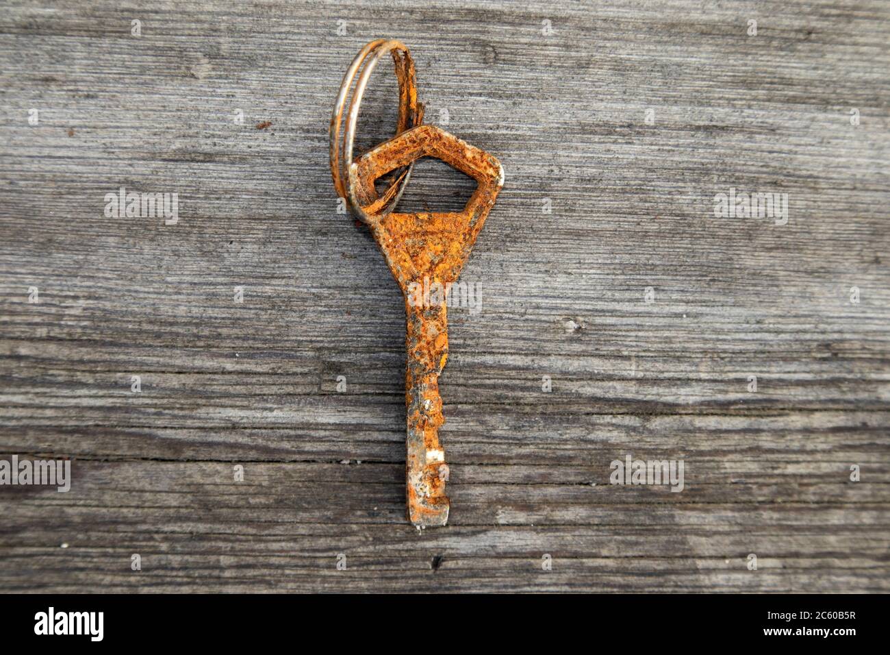 corroded old key on ground Stock Photo - Alamy