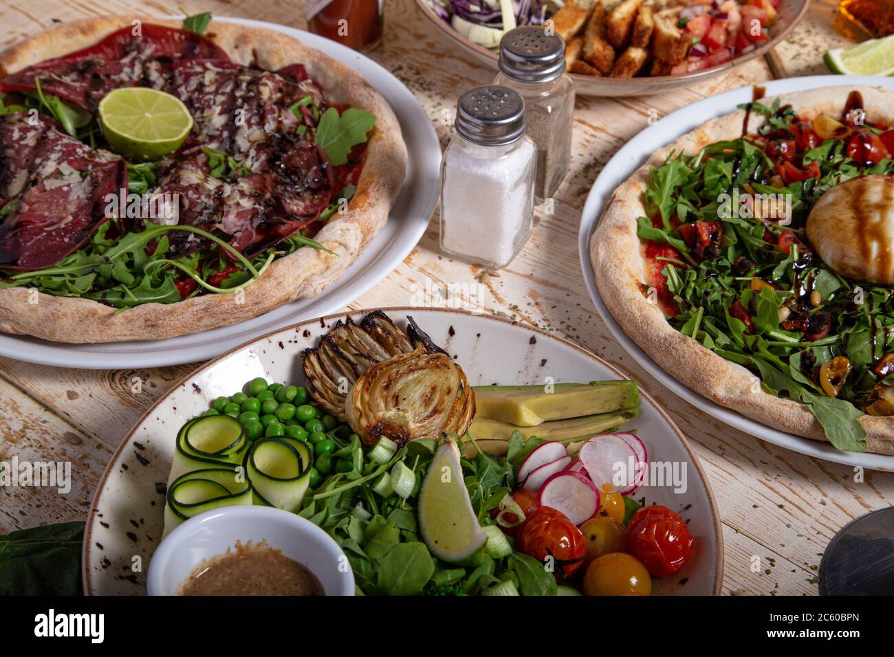 Closed image of healthy dishes on wooden table. Restaurant menu Stock ...
