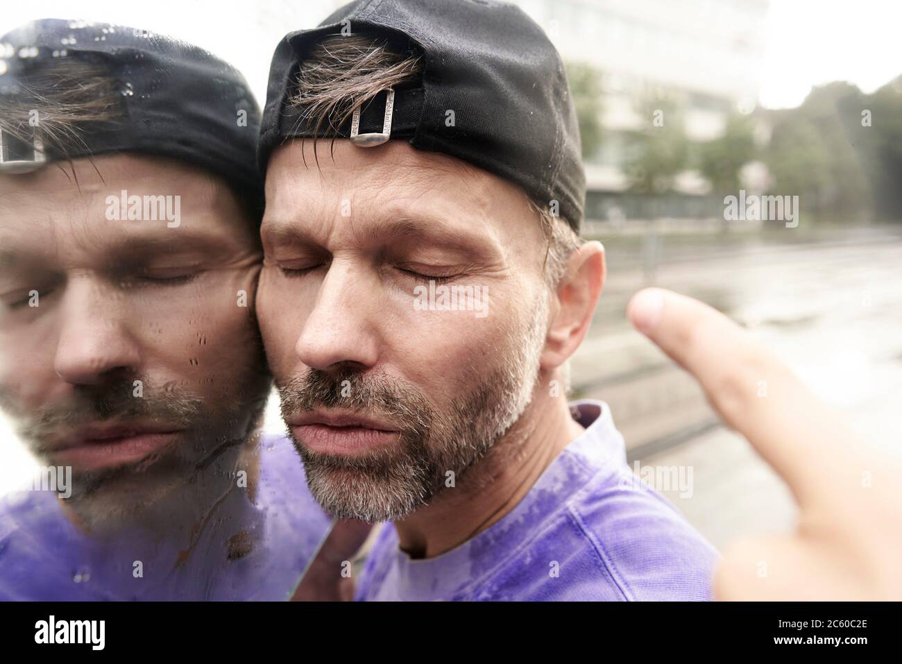 Person multiple reflection glass hi-res stock photography and images ...