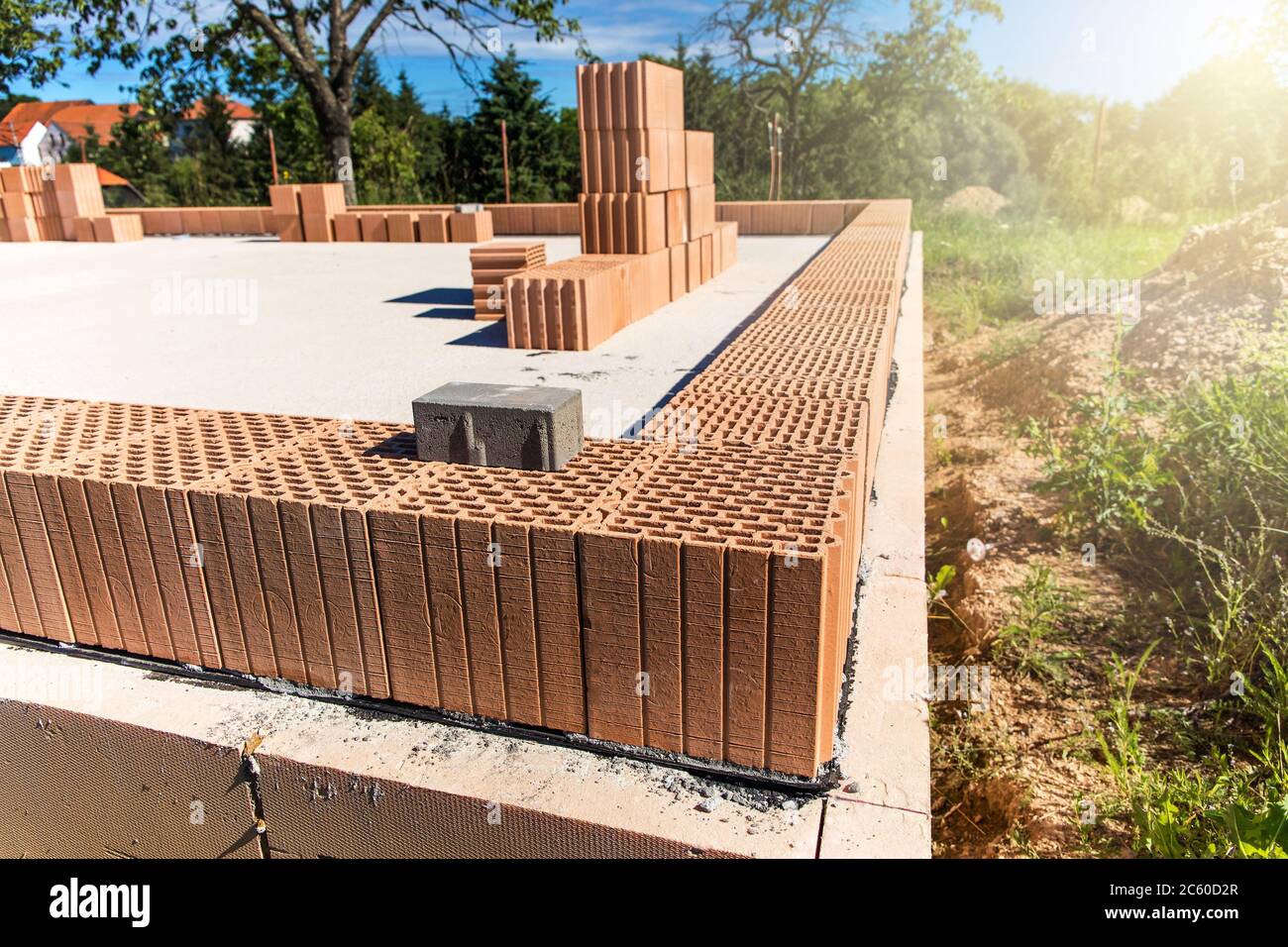 Construction site of a family house. Concrete base plate. Wall ...