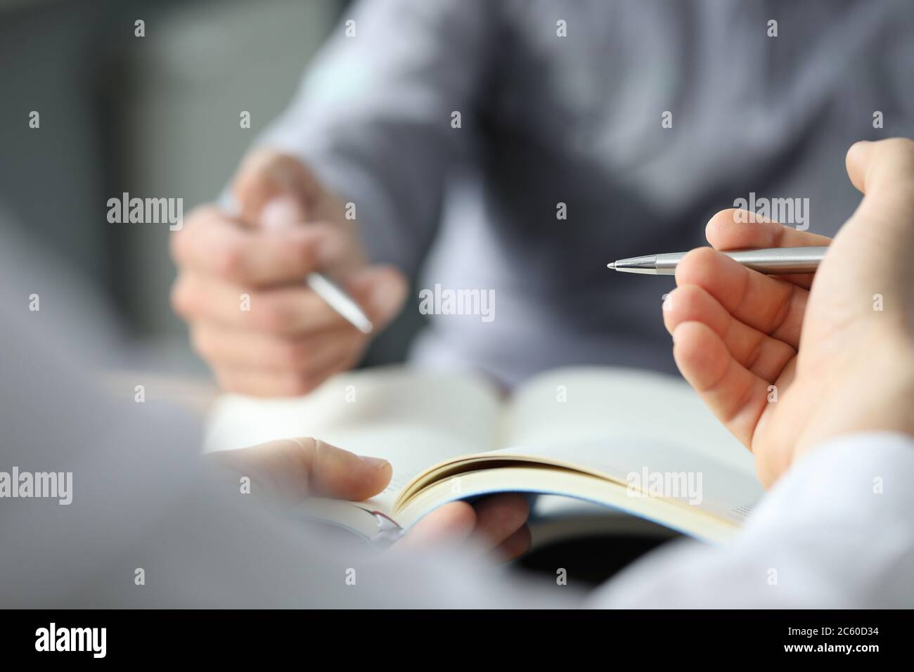 Business partners sign contract two hi-res stock photography and images ...