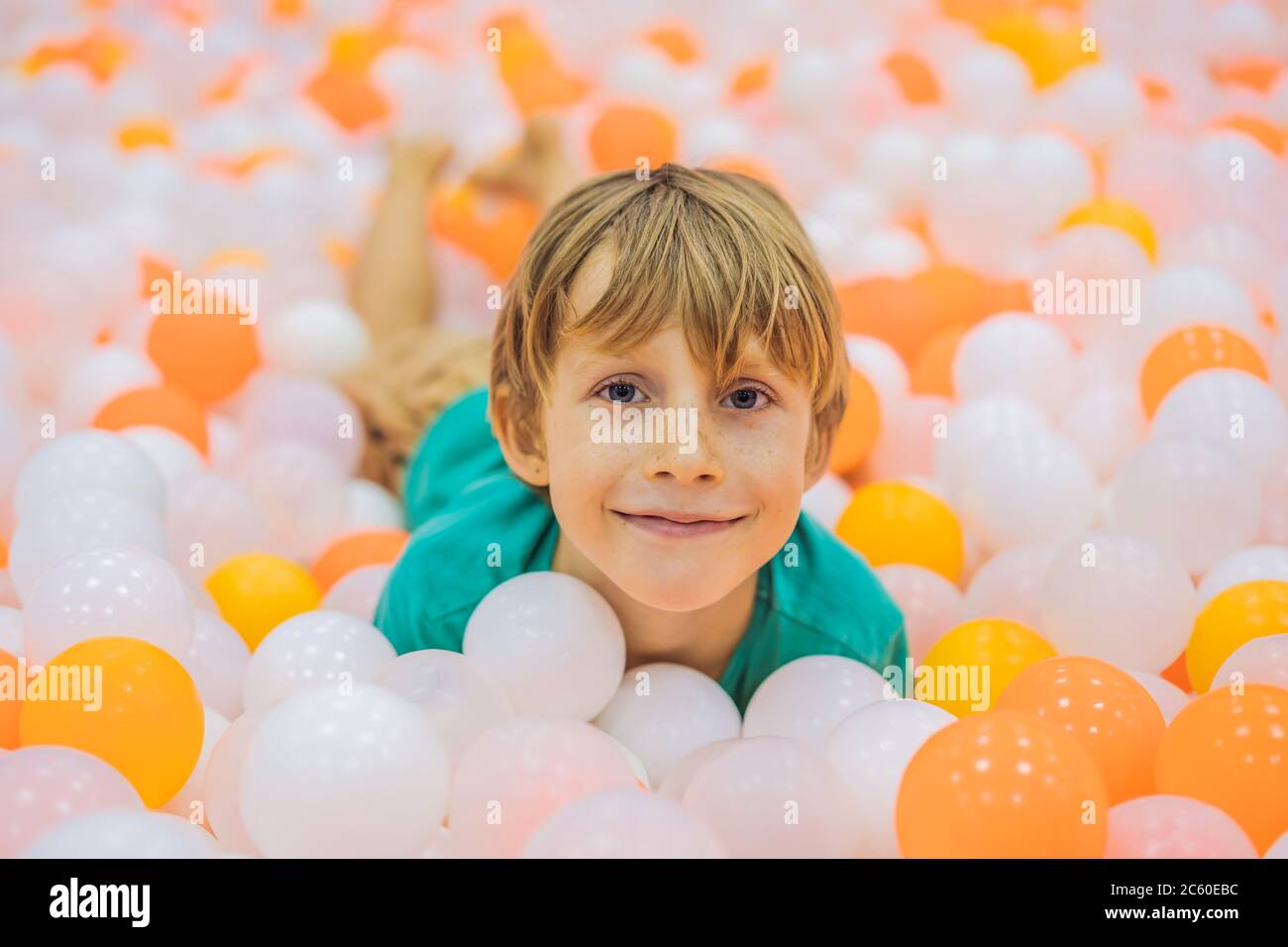 Girl in ball pit hi-res stock photography and images - Alamy