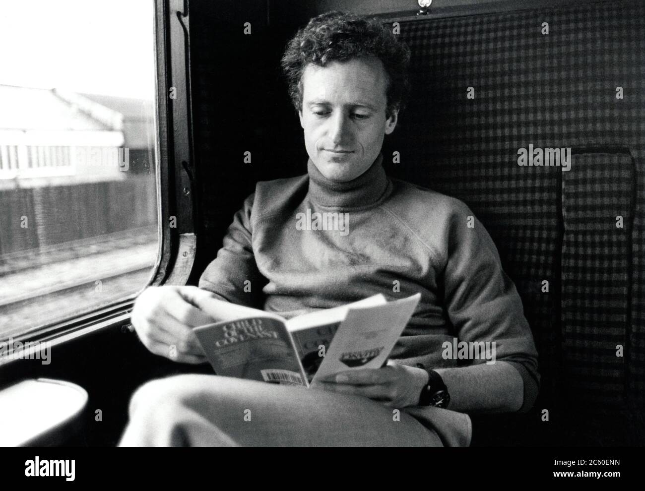 Man on a train, UK 1985 Stock Photo - Alamy