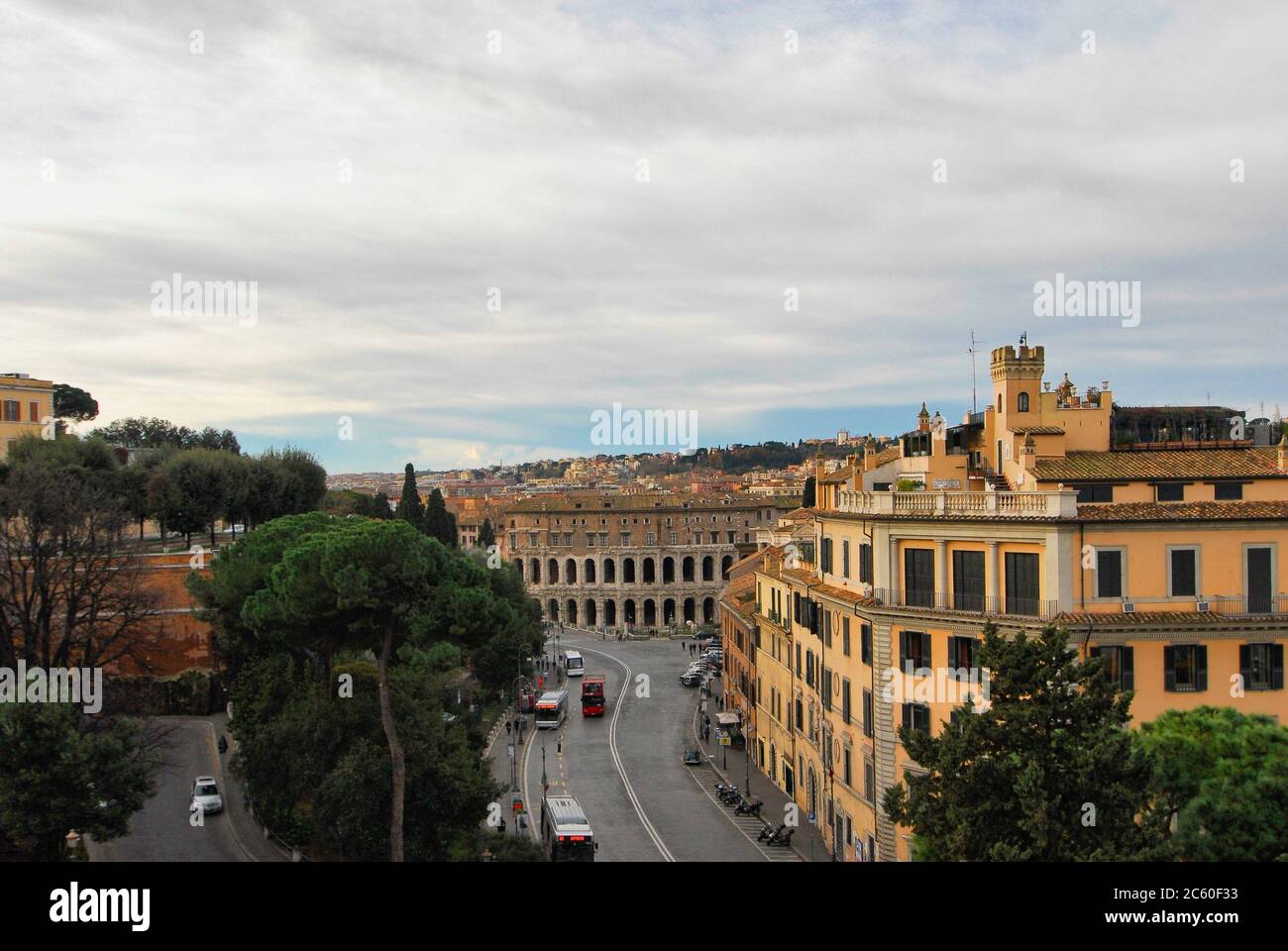 Aerial view of a street with the Coliseum in the background. Roma ...