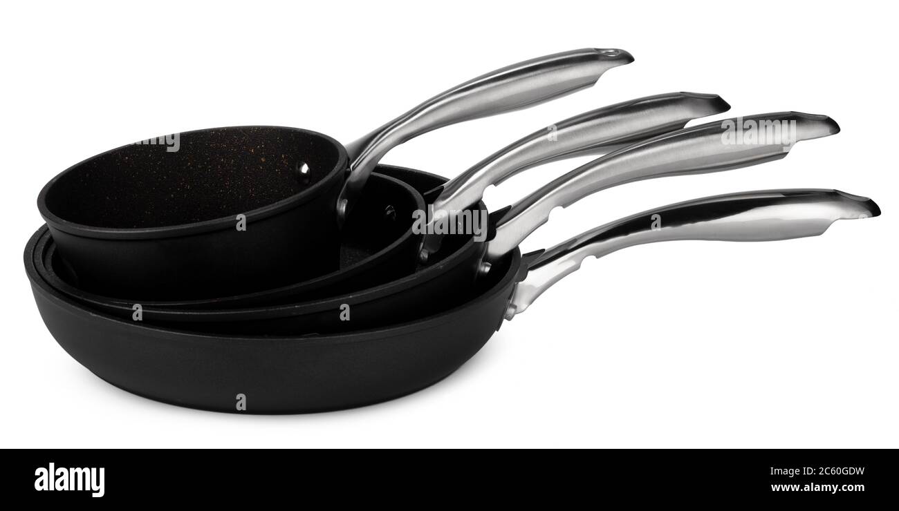 Set of new black pans isolated on white Stock Photo - Alamy