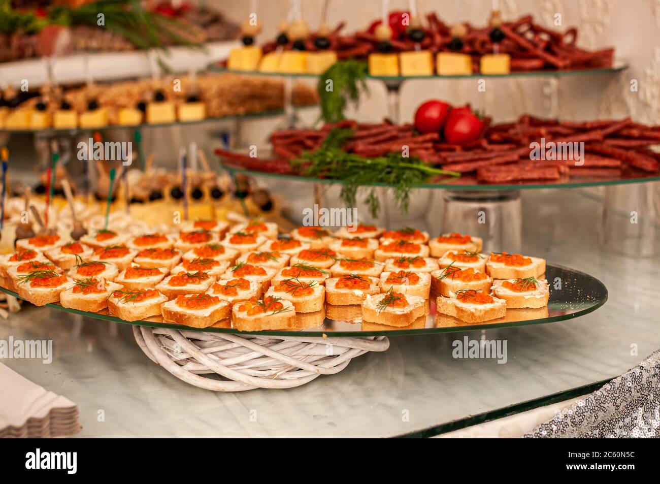 Canape with red caviar. Wedding buffet Stock Photo - Alamy