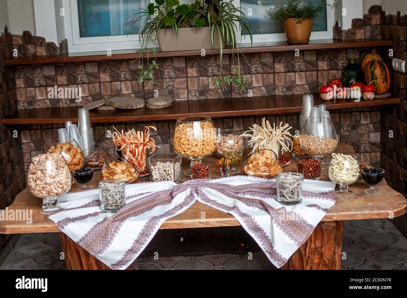 Buffet with different types of snacks and nuts Stock Photo - Alamy