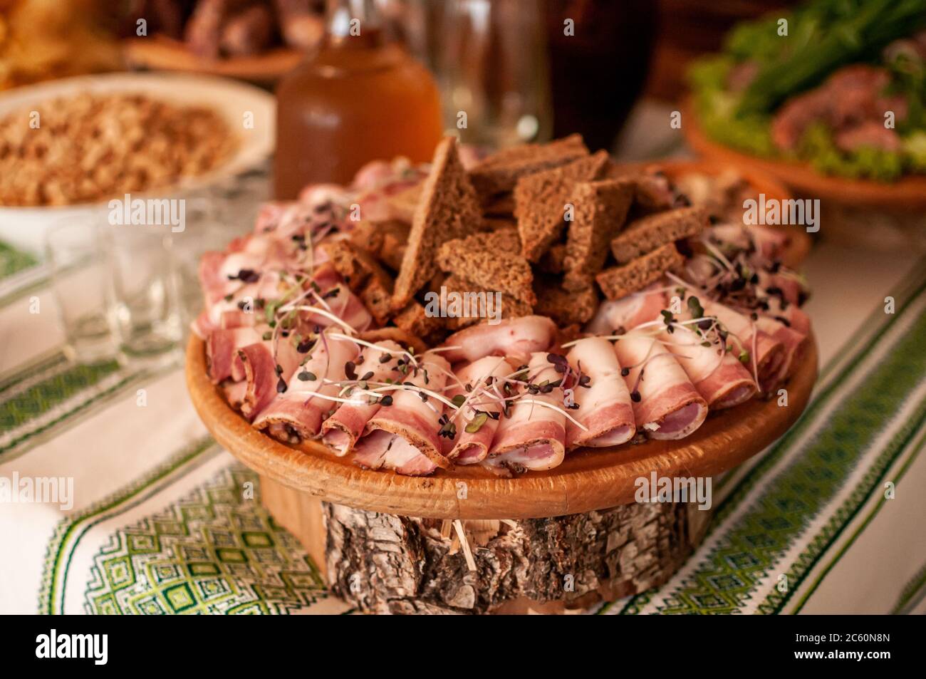 Slicing different varieties of meat Stock Photo - Alamy