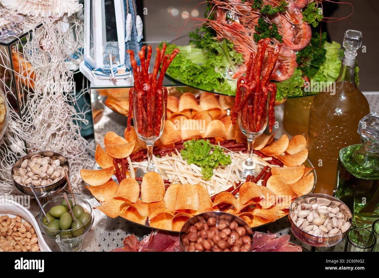 Buffet with different types of snacks and nuts Stock Photo - Alamy