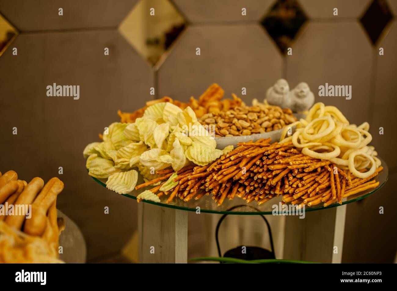 Buffet with different types of snacks and nuts Stock Photo - Alamy
