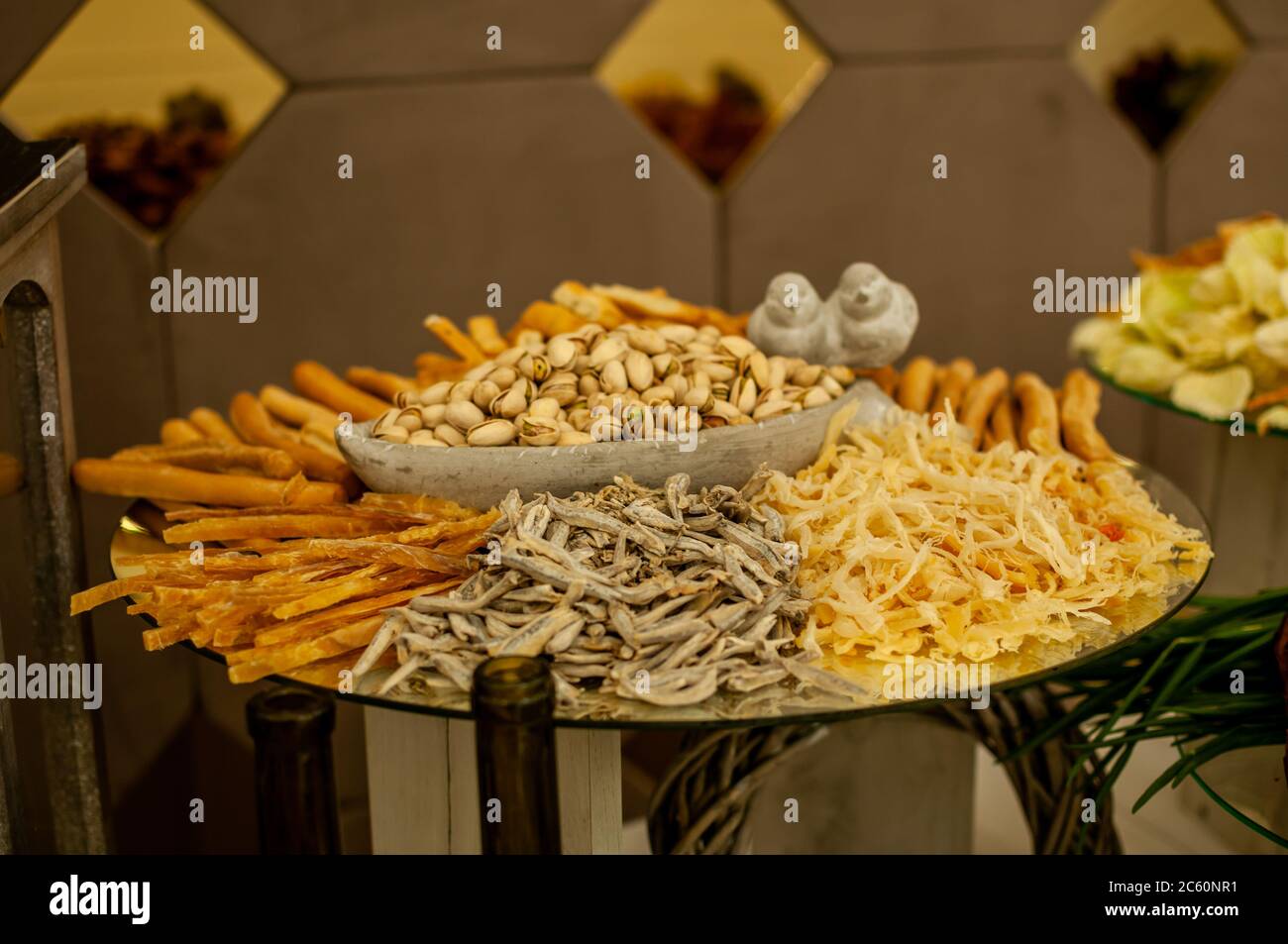 Buffet with different types of snacks and nuts Stock Photo - Alamy