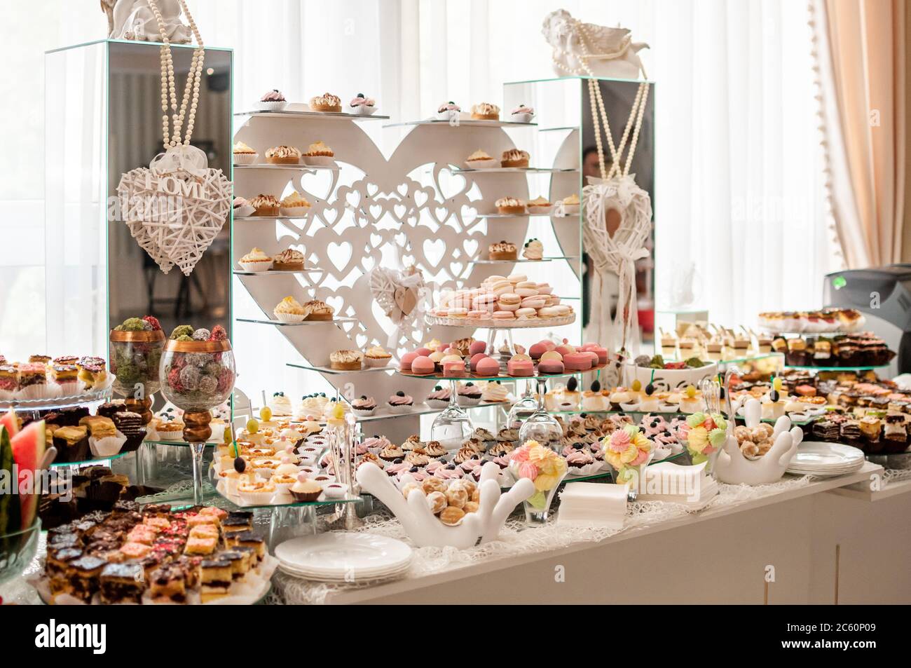 Sweet cakes at a wedding buffet. Catering Stock Photo - Alamy