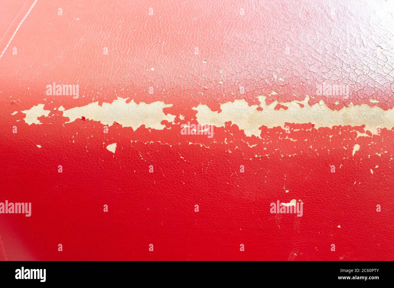 Damaged leather texture on the upholstery of the sofa and furniture ...